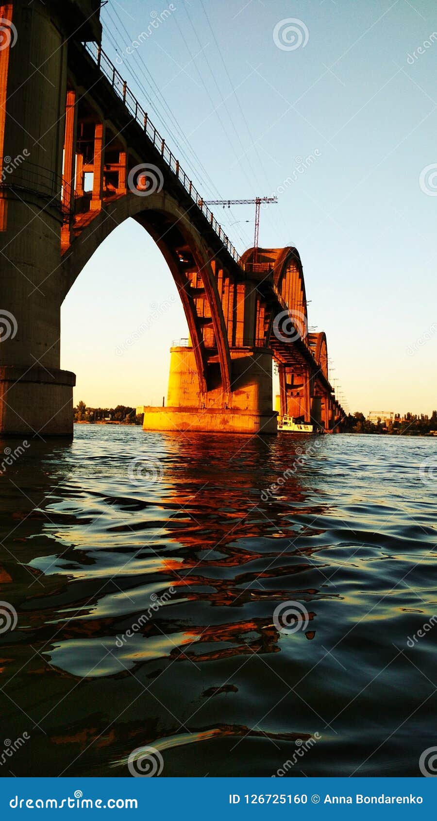 Bridge Over the River on the Sunset Stock Photo - Image of waves ...