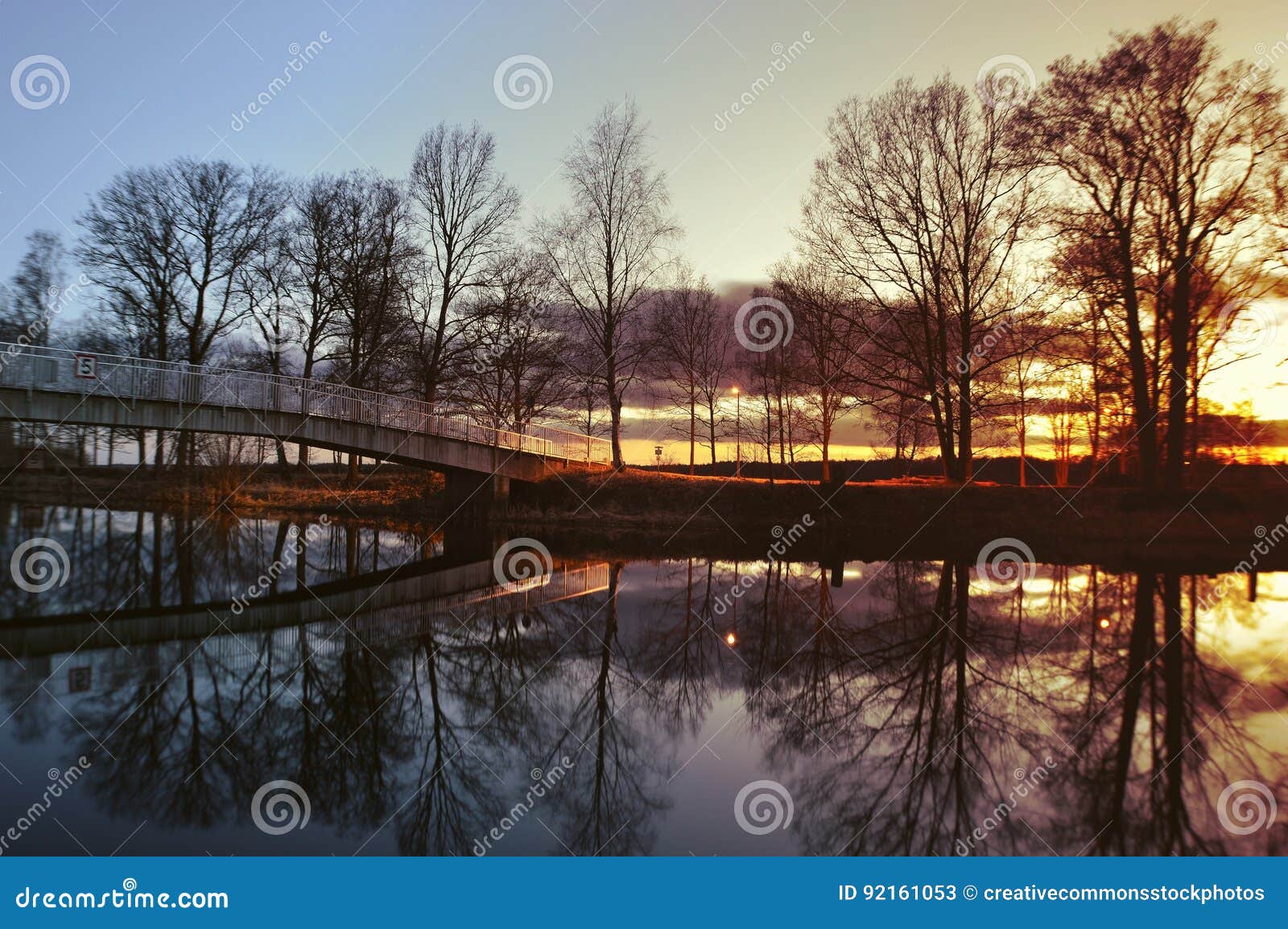 Bridge Over River At Sunset Picture. Image: 92161053
