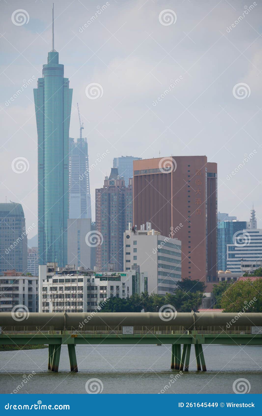 Bridge Over the Sheung Yu River and Buildings in the Background ...