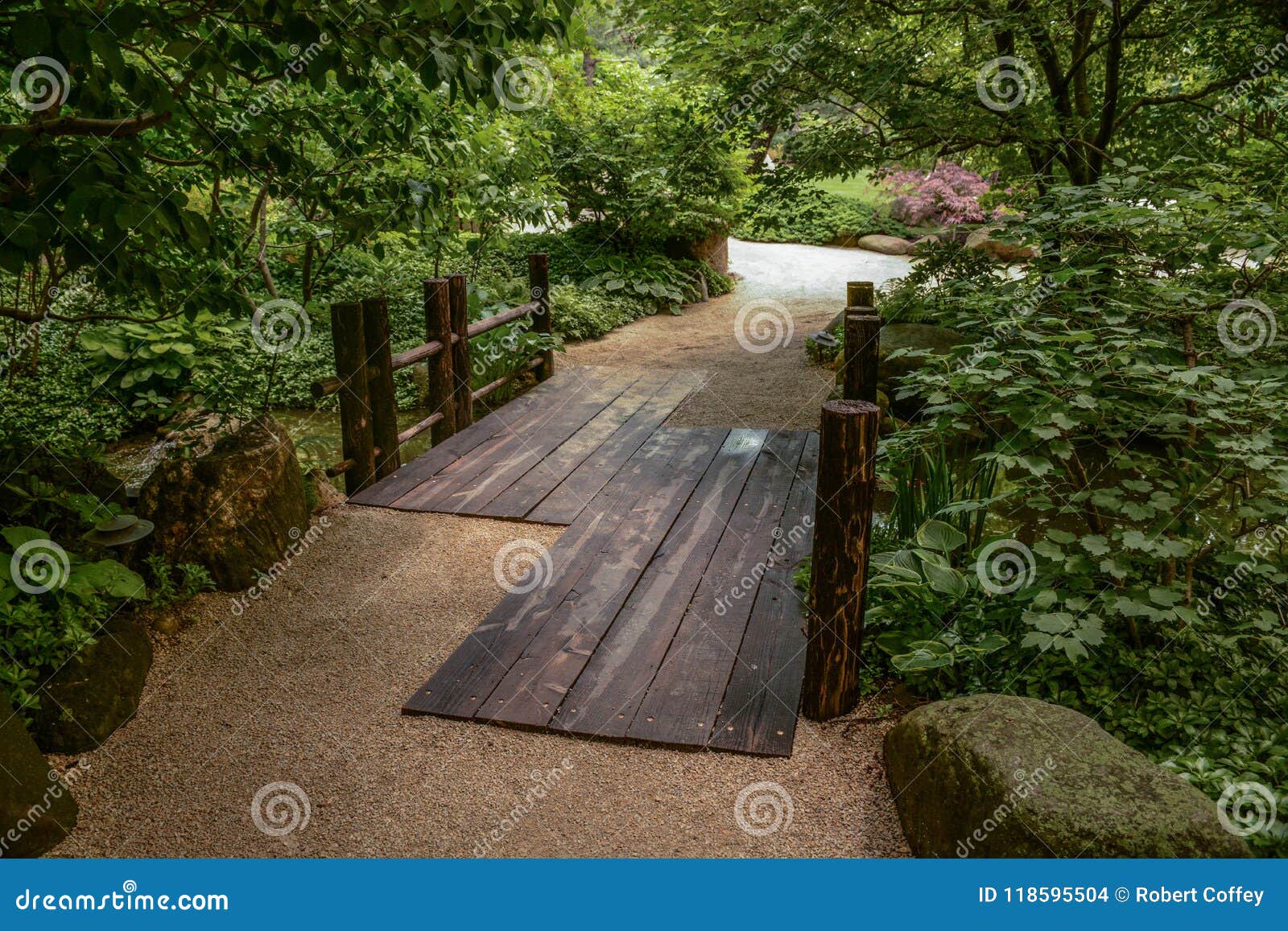 A Bridge Over a Small Stream Stock Photo - Image of stream, rocks ...