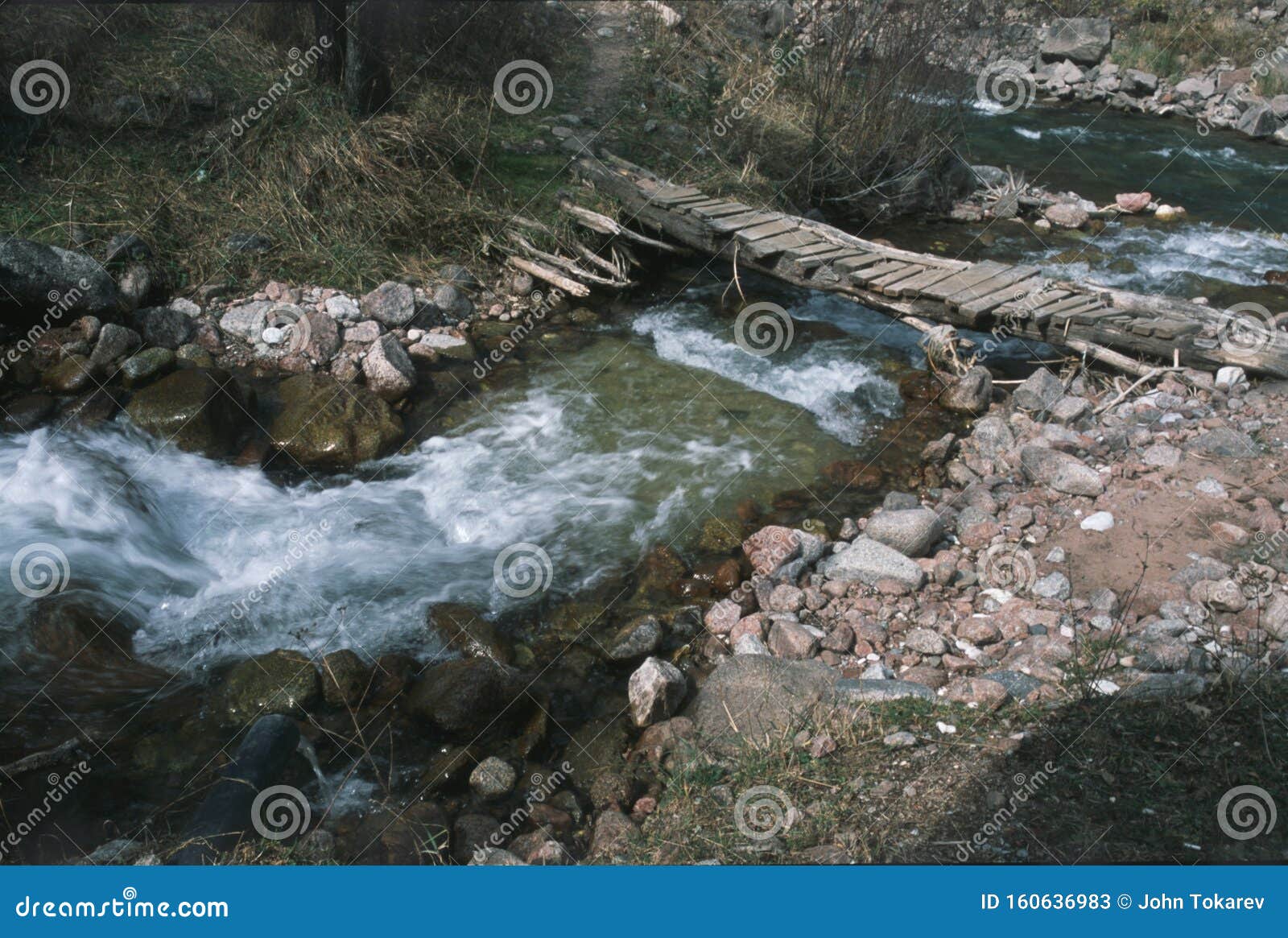 Bridge Over a Stream stock image. Image of stream, riverside - 160636983