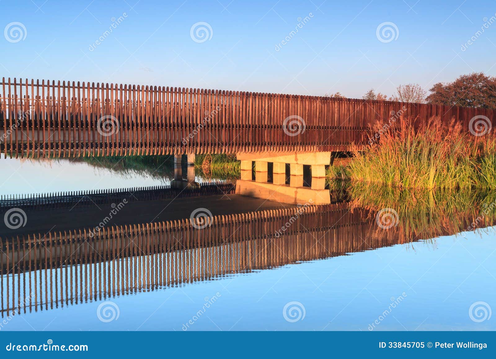Bridge Over Water in Early Morning Light Stock Image - Image of holland ...