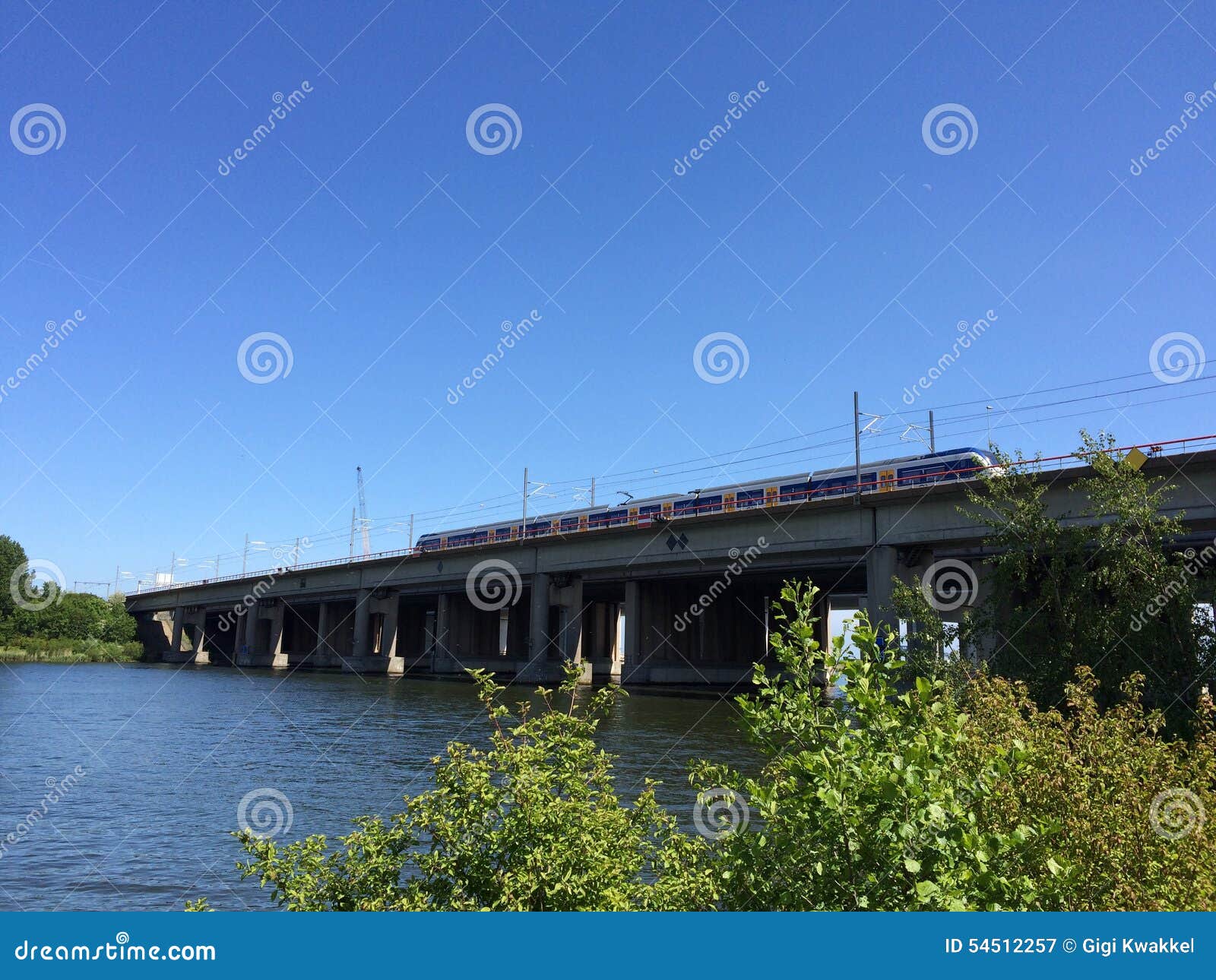 Bridge Over Water with Train Stock Image - Image of train, reservoir ...