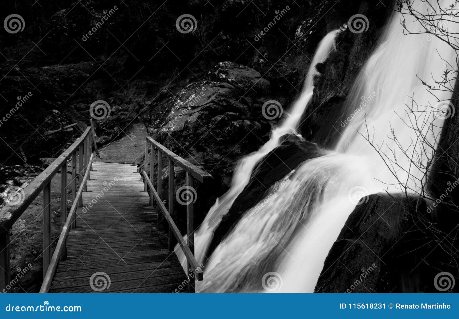 Bridge Over Waterfall stock image. Image of black, shore - 115618231