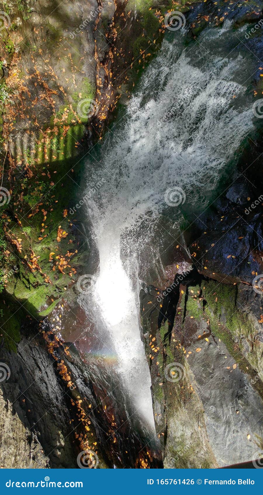 Bridge over the waterfall stock photo. Image of mountains - 165761426