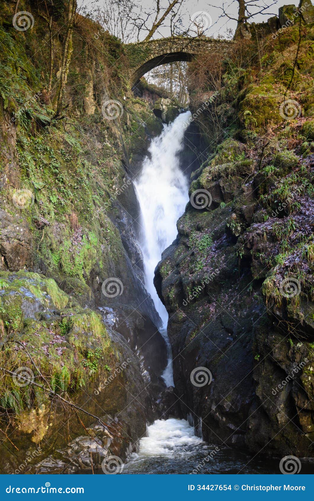 Bridge over Waterfall stock photo. Image of bridge, waterfall - 34427654