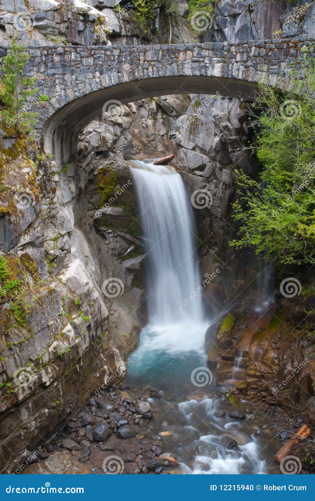 Bridge over a waterfalls stock photo. Image of beauty - 12215940