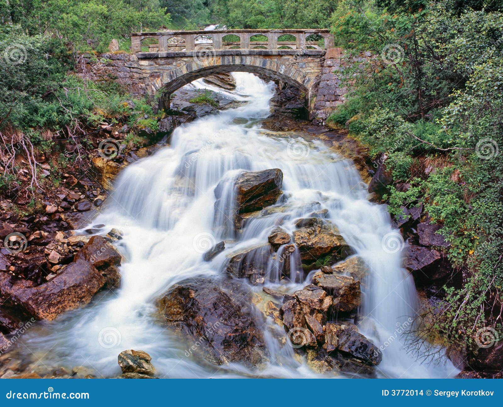 Bridge over waterfalls stock photo. Image of outdoors - 3772014