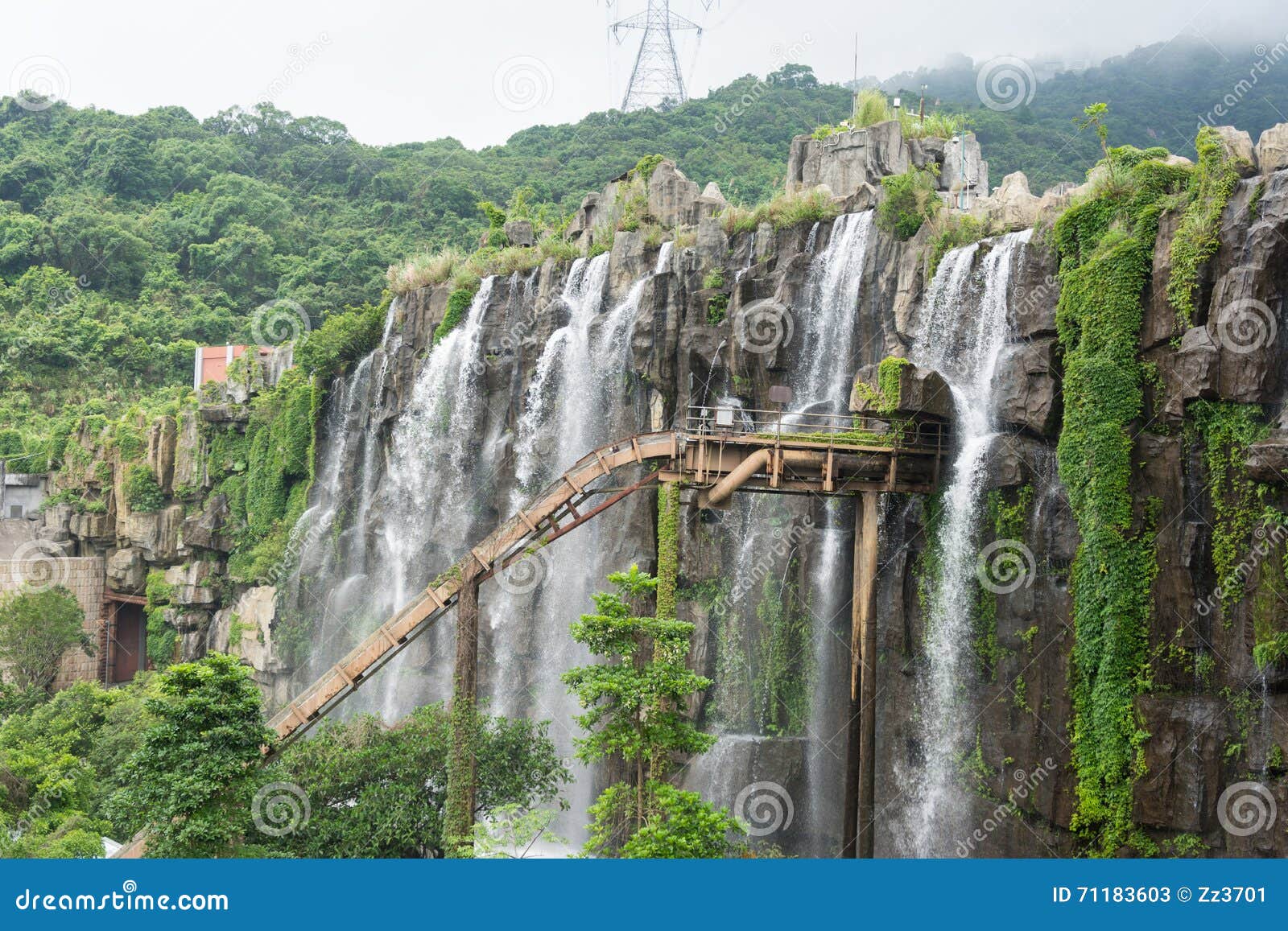 Bridge over waterfalls stock image. Image of cloud, falling - 71183603