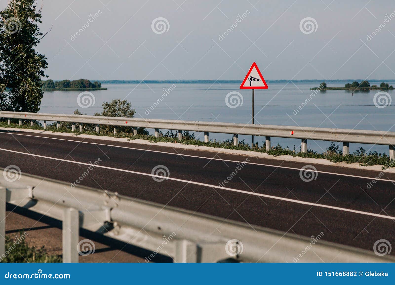 Bridge Over Wide River. Worth Road Sign Stock Photo - Image of outdoors ...