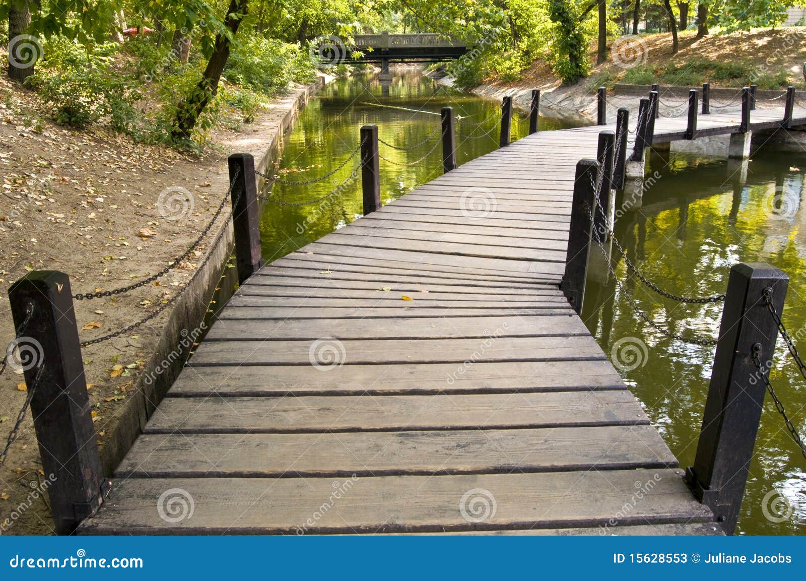 Bridge in a park stock image. Image of water, summer - 15628553
