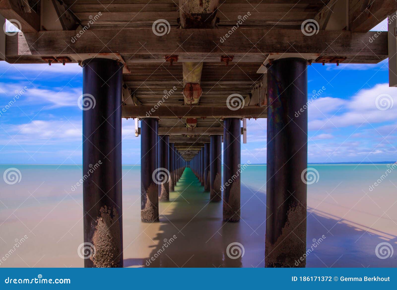 Bridge / pier over ocean stock photo. Image of bridge - 186171372