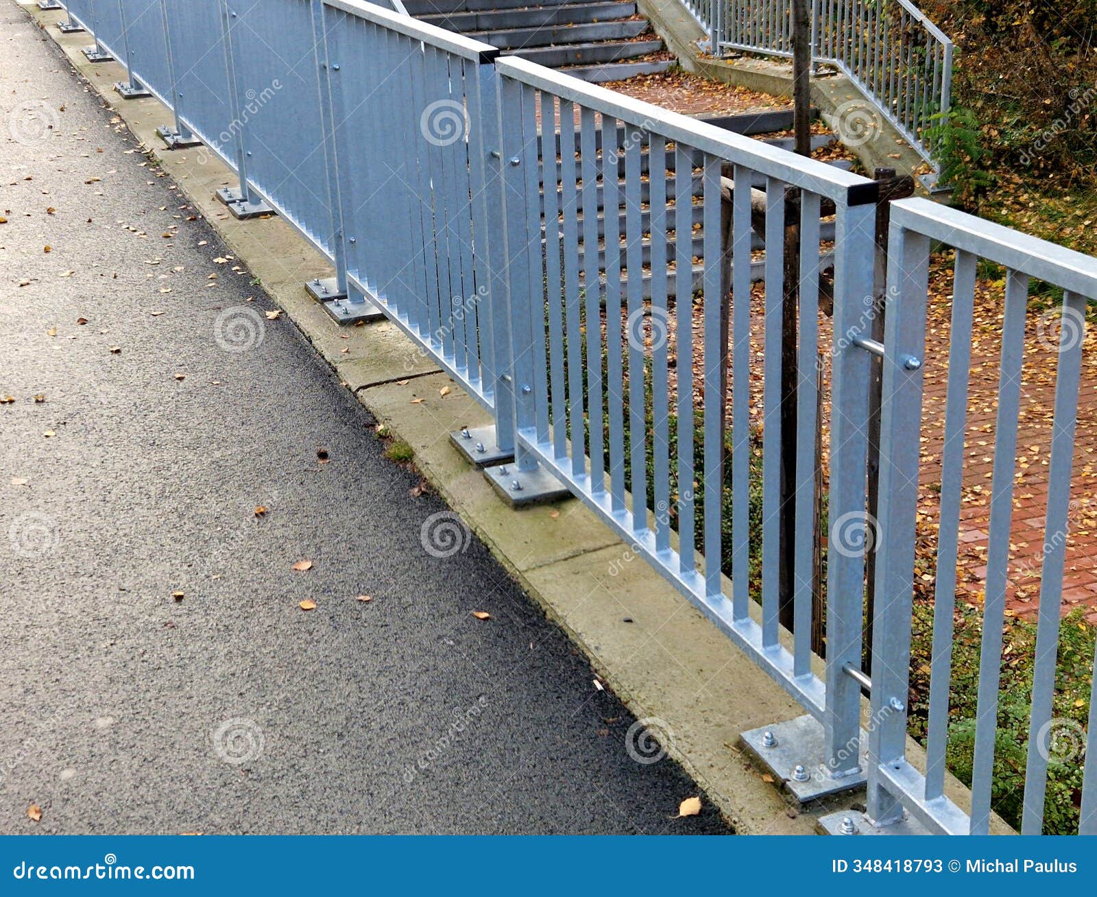 Bridge Railing with Vertical Fence Posts Anchored into the Ground Stock ...