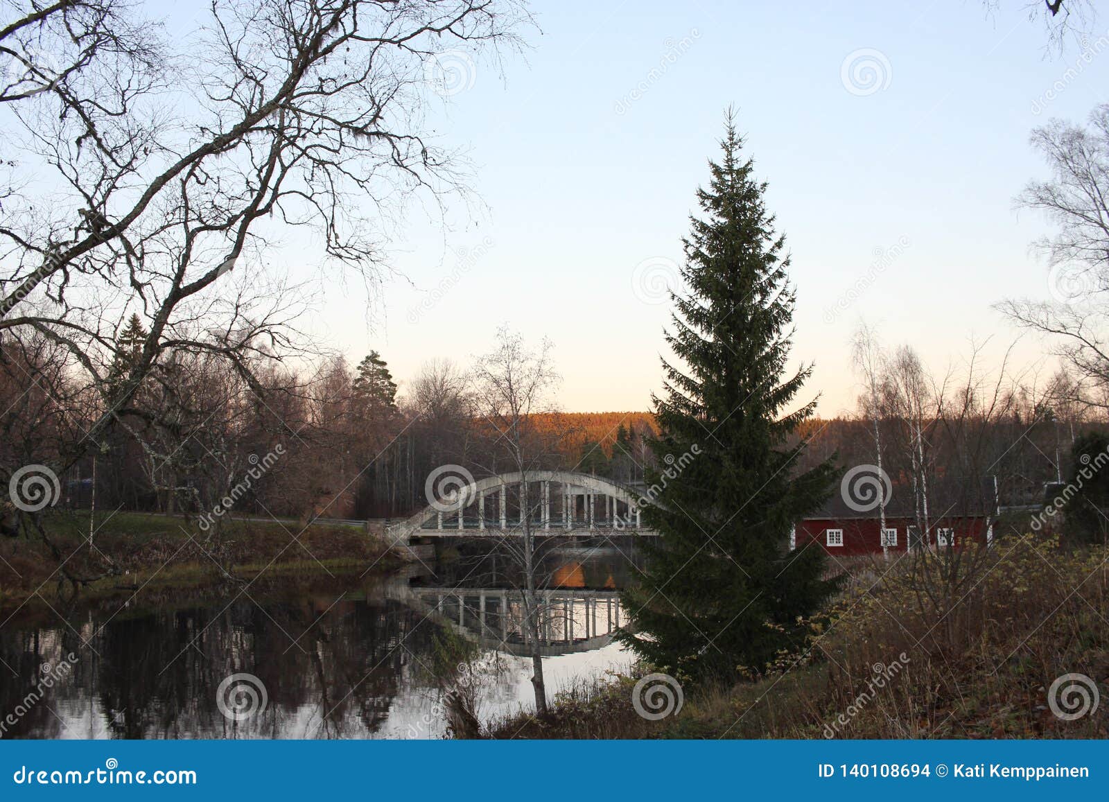 A bridge and a red house stock photo. Image of green - 140108694