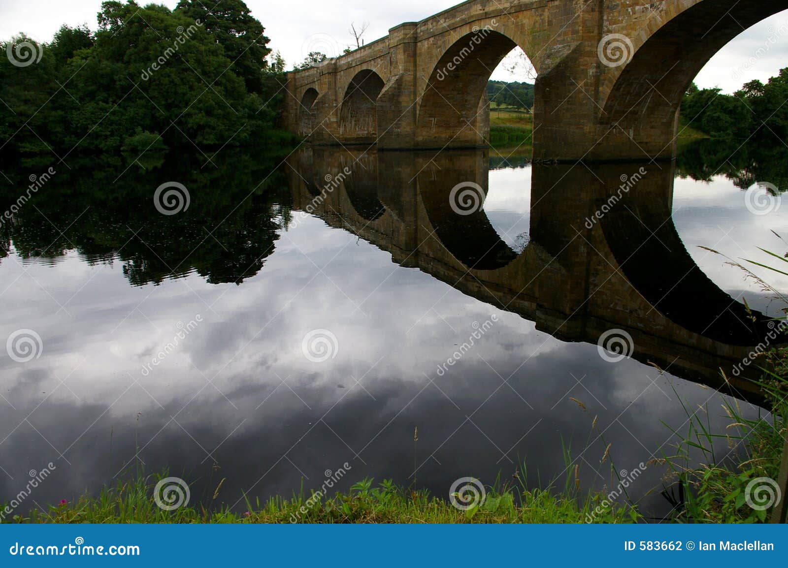Bridge Reflection stock photo. Image of clouds, river, bridge - 583662
