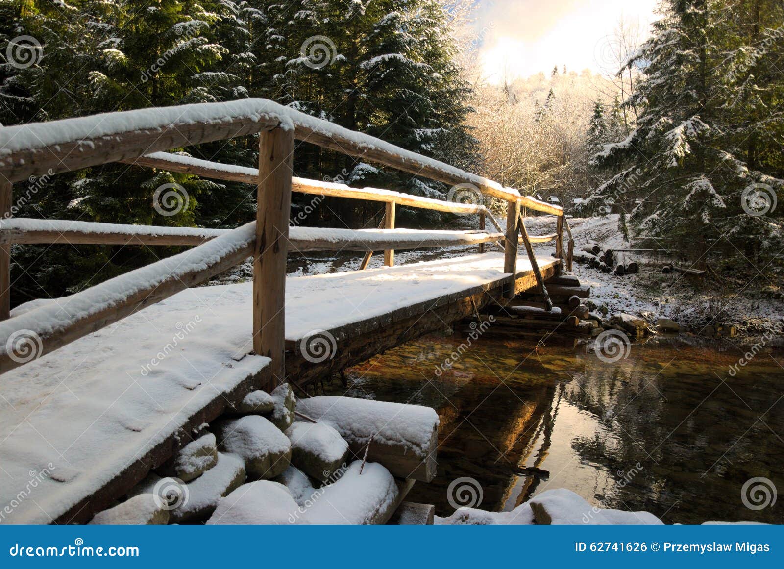 Bridge on river with snow stock photo. Image of footbridge - 62741626