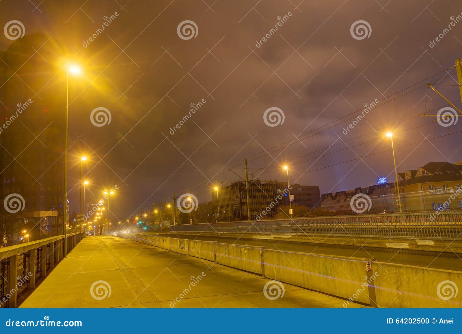 A Bridge and a Road at Night with Shining Lights on Both Sides ...