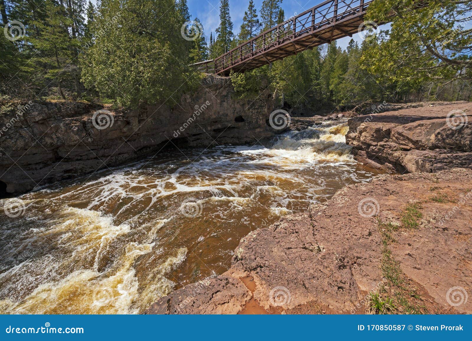 Bridge Spanning a Dramatic Cascade Stock Image - Image of erosion ...