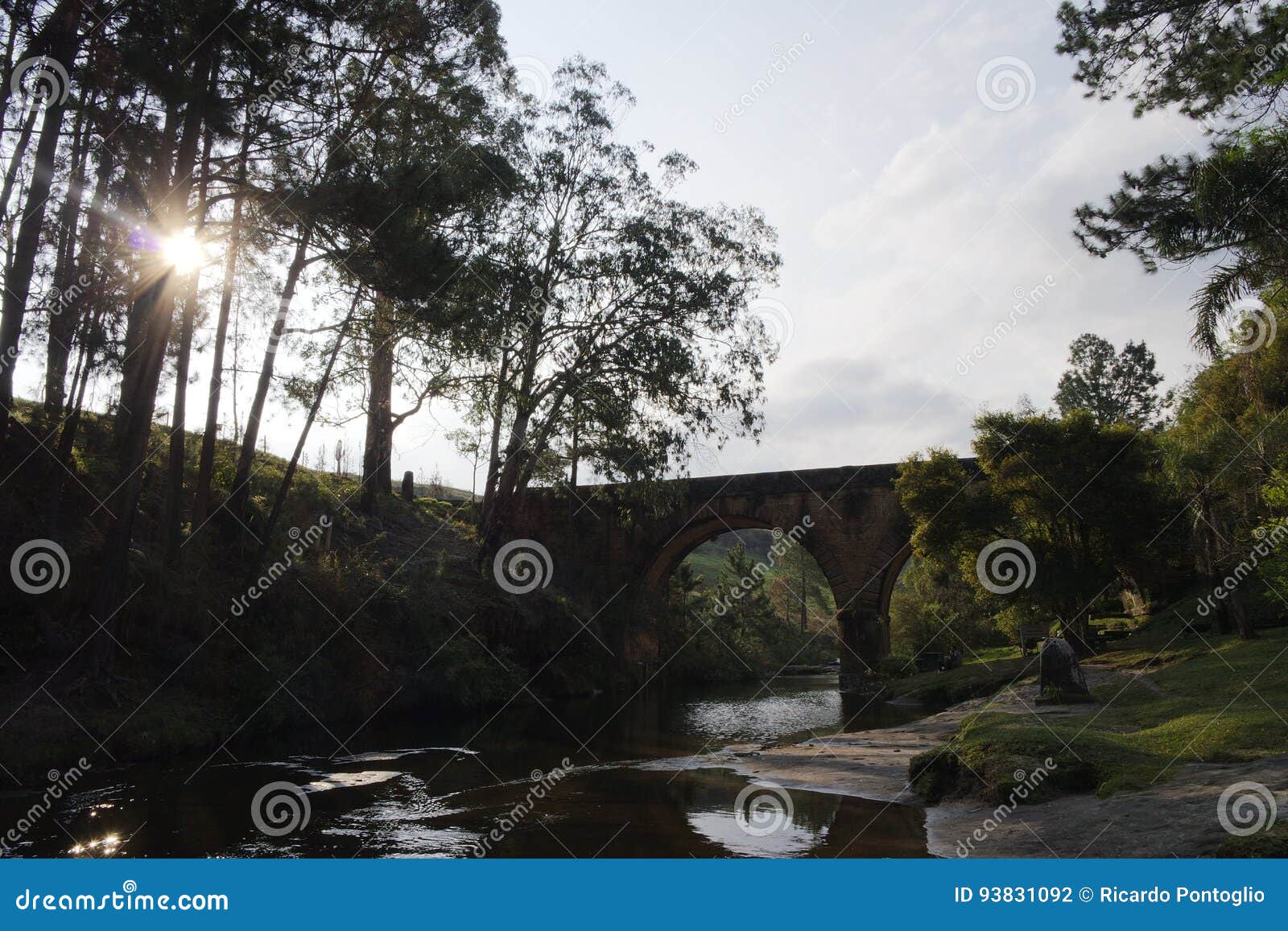 Bridge at sunset stock photo. Image of afternoon, lake - 93831092