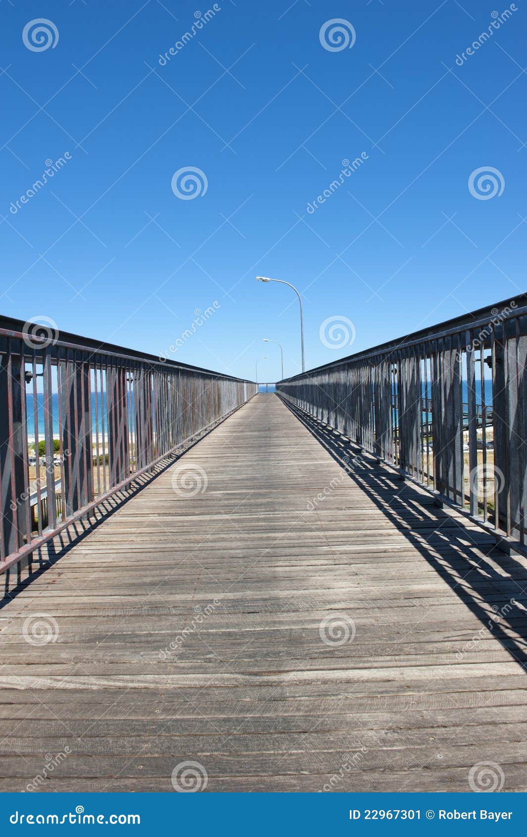 Bridge to Infinity stock image. Image of seaside, lamp - 22967301