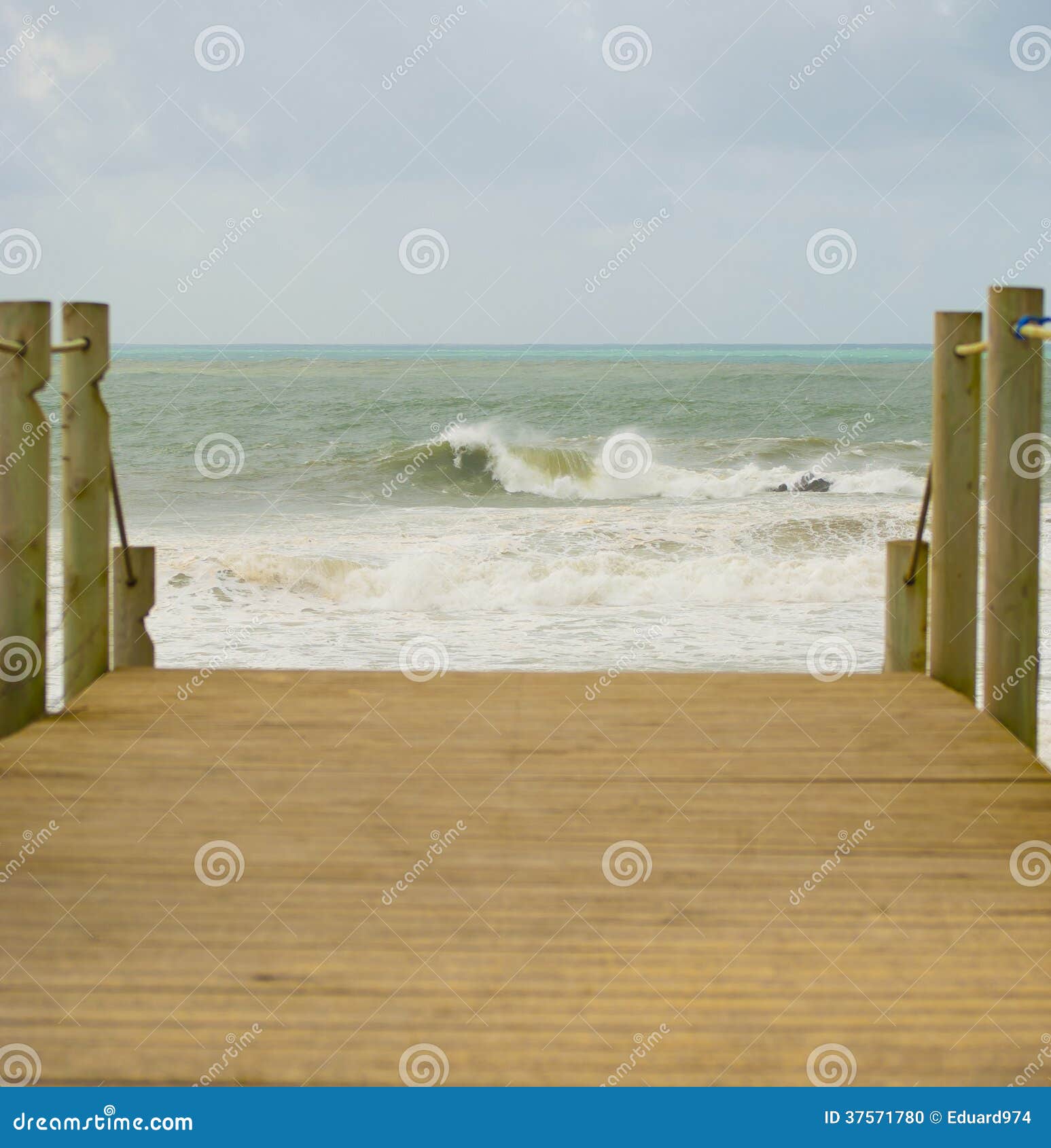 Bridge to the sea stock photo. Image of outstretched - 37571780