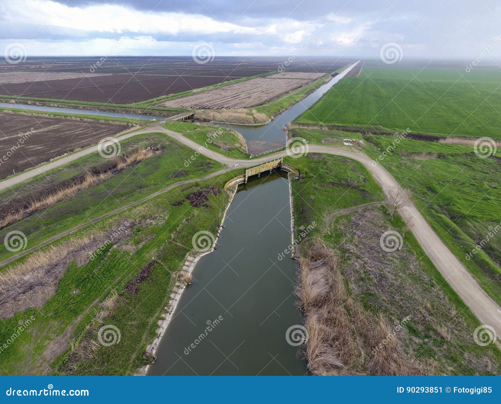 Bridges through Irrigation Canals. Rice Field Irrigation System Stock ...