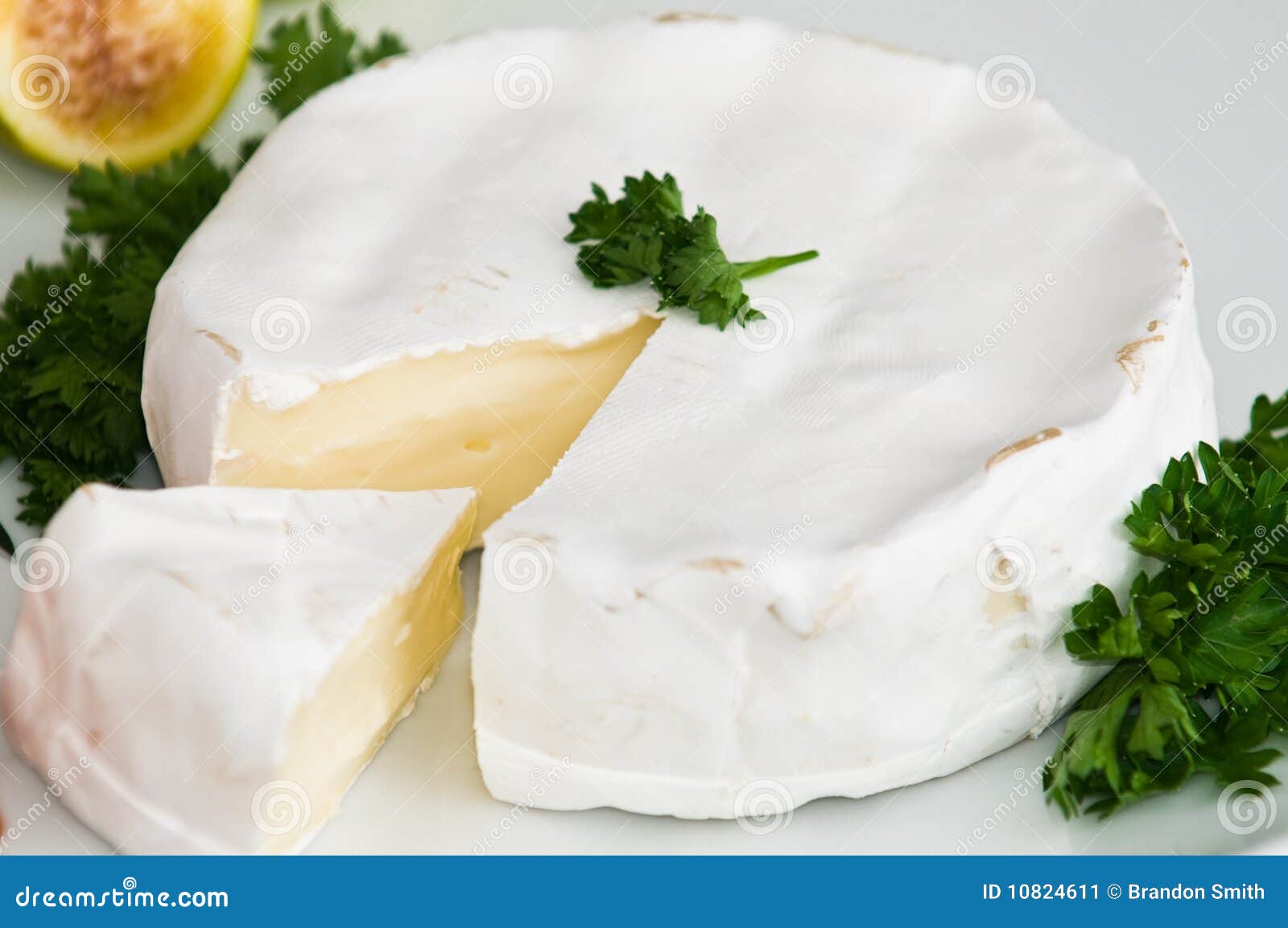 Brie Cheese stock image. Image of wheel, snack, parsley - 10824611