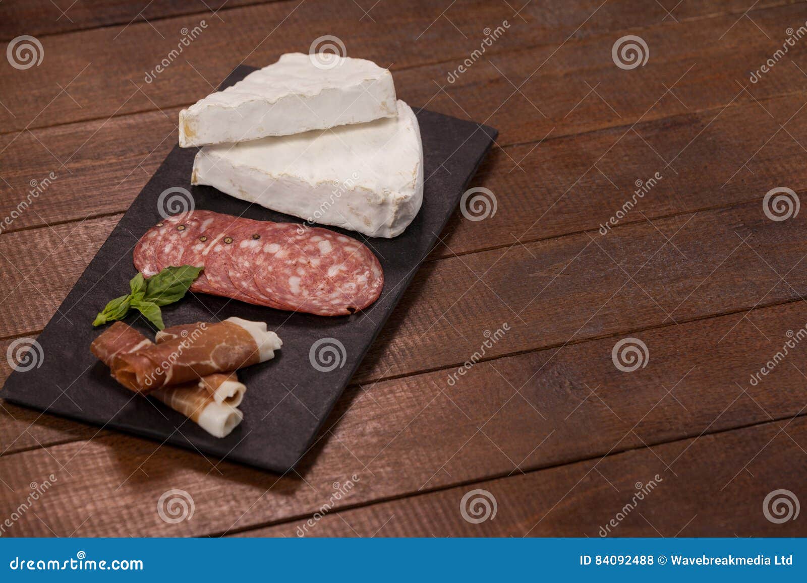 Brie Cheese, Salami, Basil and Sliced Meat Stock Photo - Image of ...