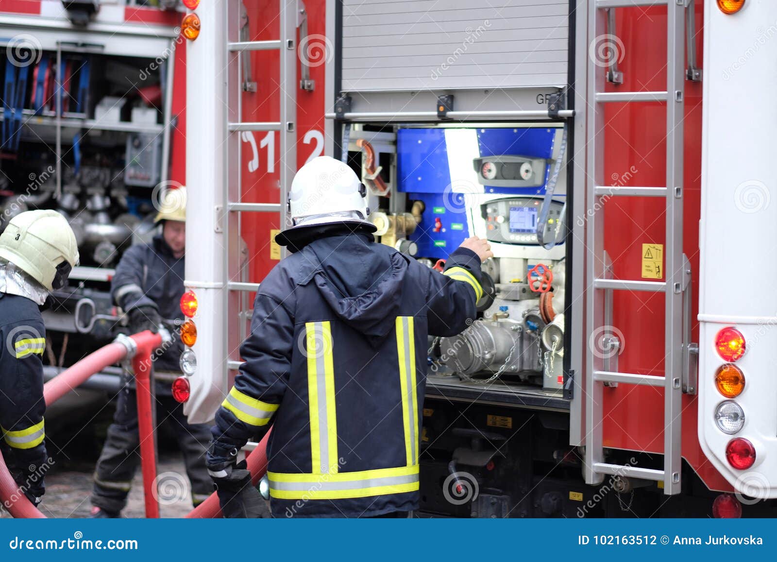 Firemen at the Control Panel of the Machine Editorial Photography ...