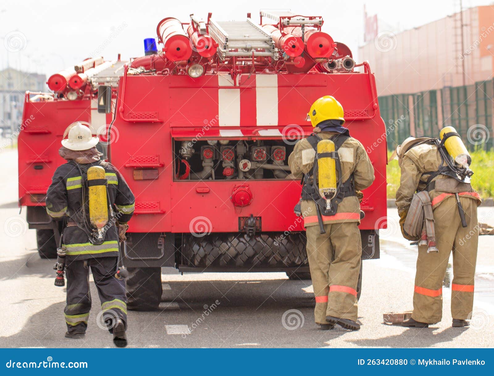 A Brigade of Firefighters Deploys Equipment for Tasks Stock Photo ...