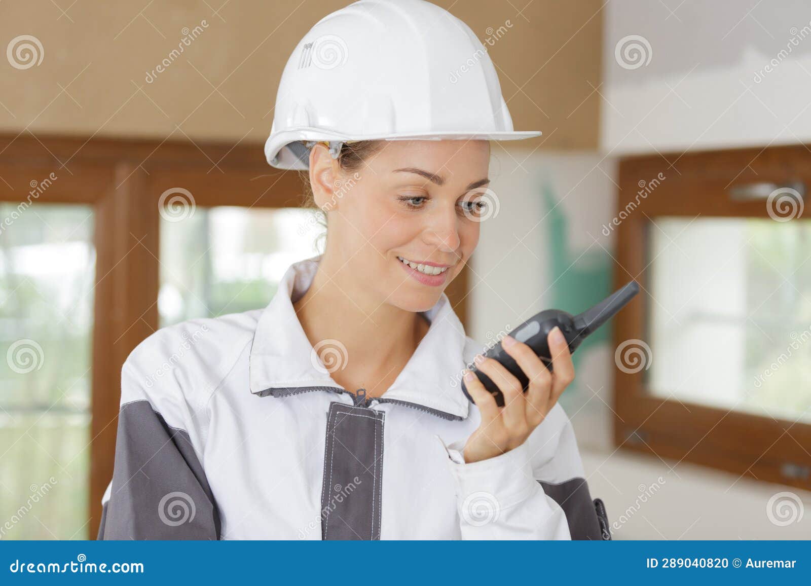 Brigadier Woman with Walkie-talkie in Construction Site Stock Photo ...