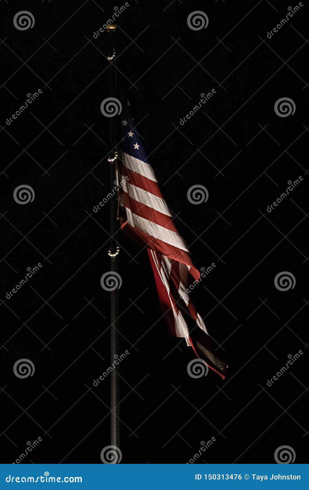Bright American Flag Flapping and Flying High in Night Stock Photo ...