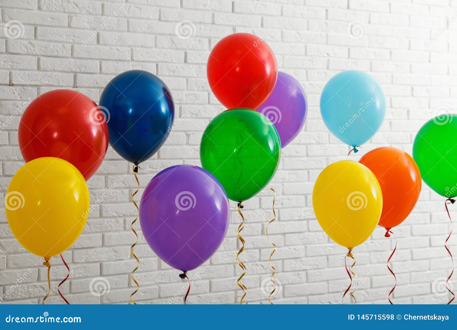 Bright Balloons Near Wall. Celebration Time Stock Photo - Image of ...