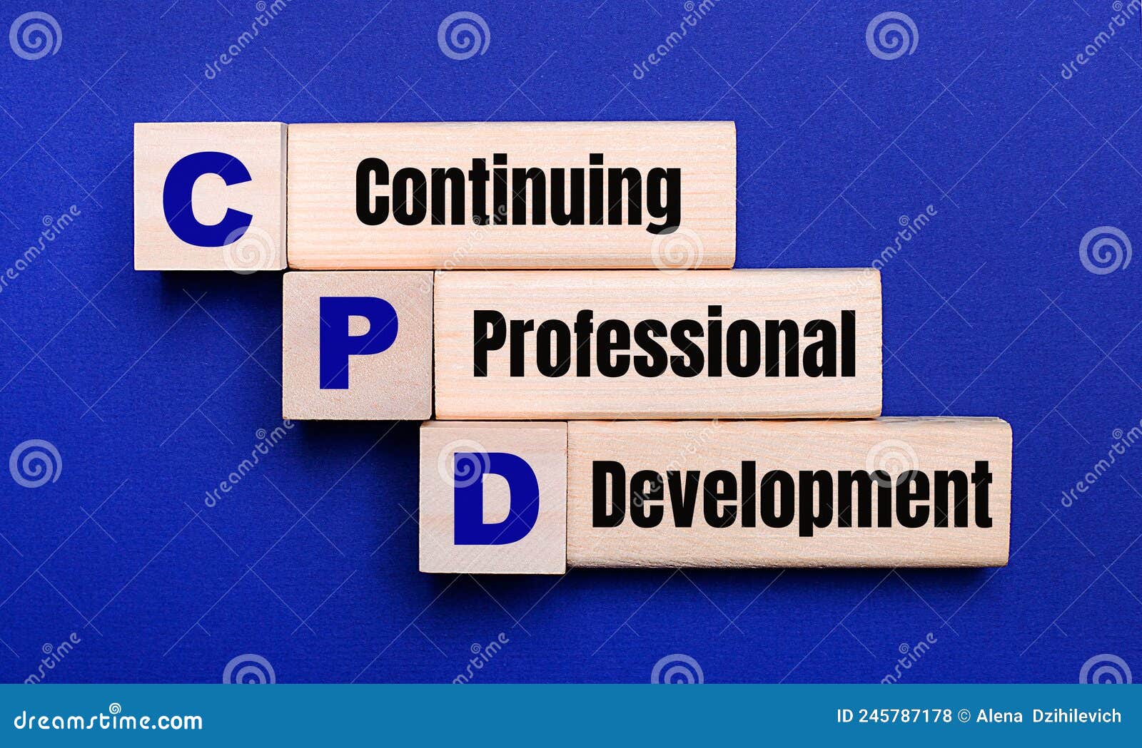 On a Bright Blue Background, Light Wooden Blocks and Cubes with the ...