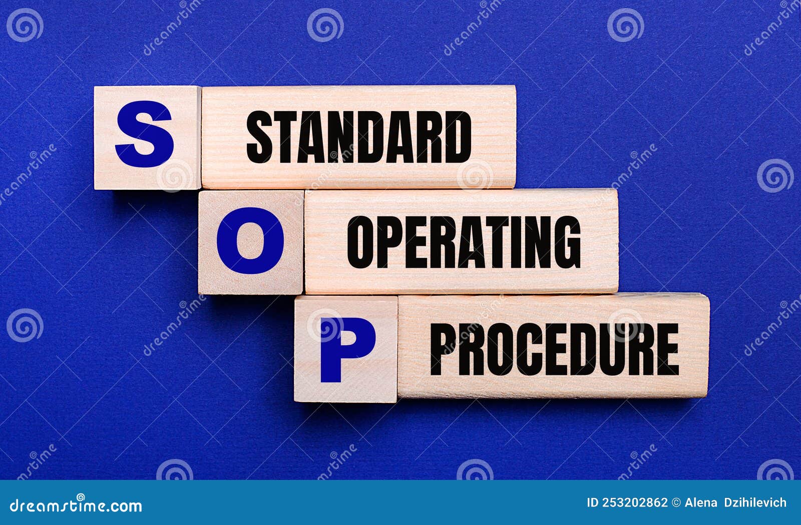 On a Bright Blue Background, Light Wooden Blocks and Cubes with the ...