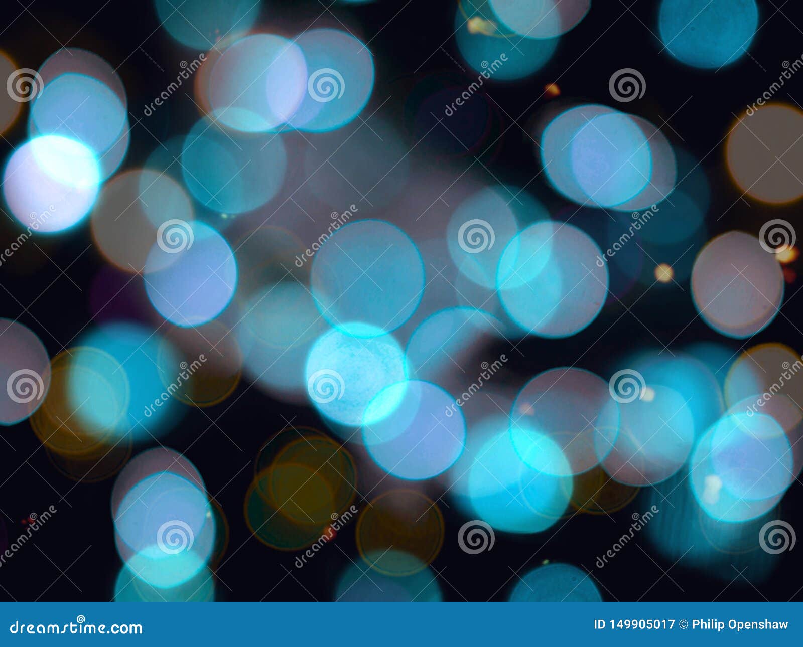 Bright Blue Circular Blue Illuminated Blurred Lights on a Black ...