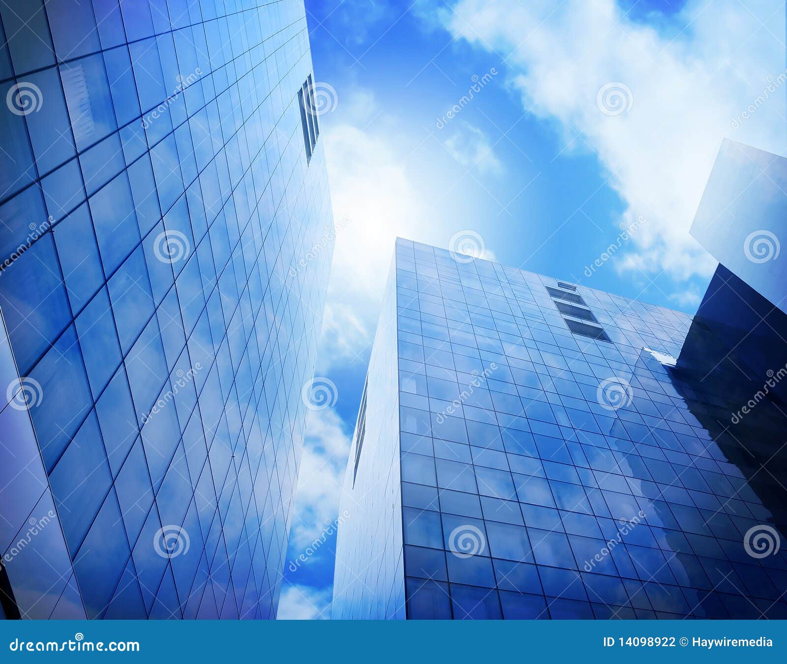 Bright Blue City Buildings with Clouds Stock Photo - Image of ...