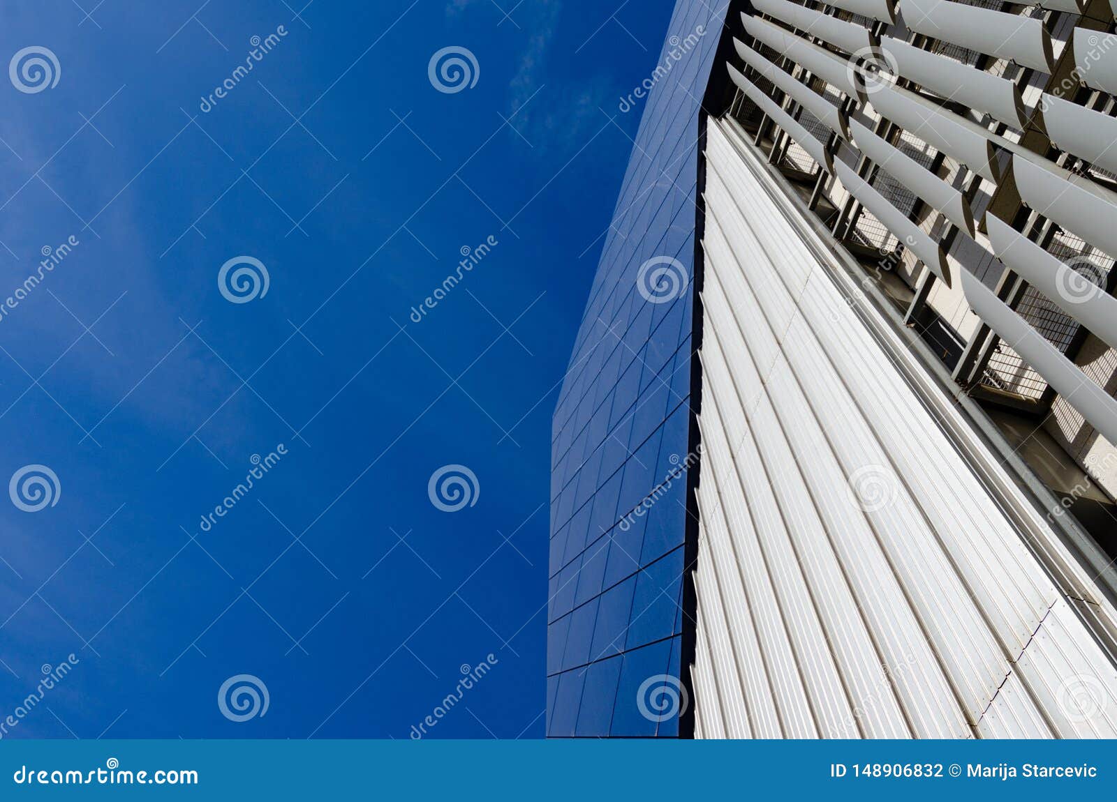 Bright Blue City Buildings with Clouds Stock Photo - Image of ...