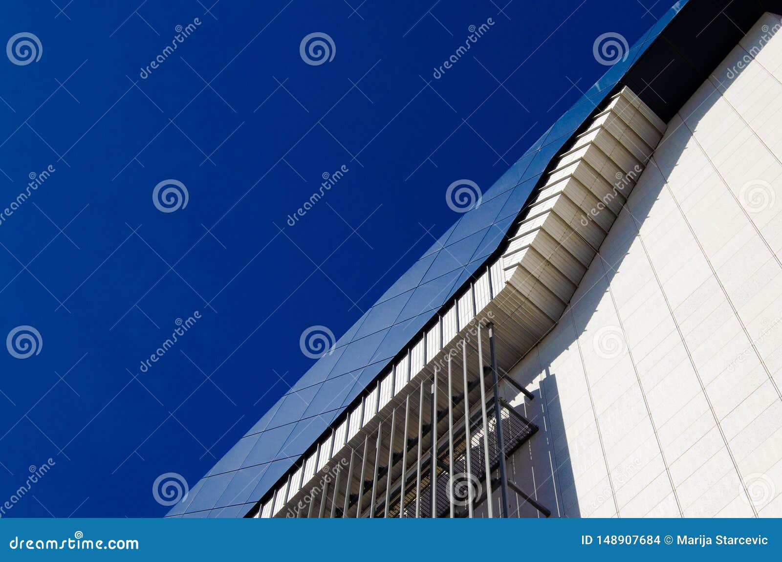 Bright Blue City Buildings with Clouds Stock Photo - Image of ...