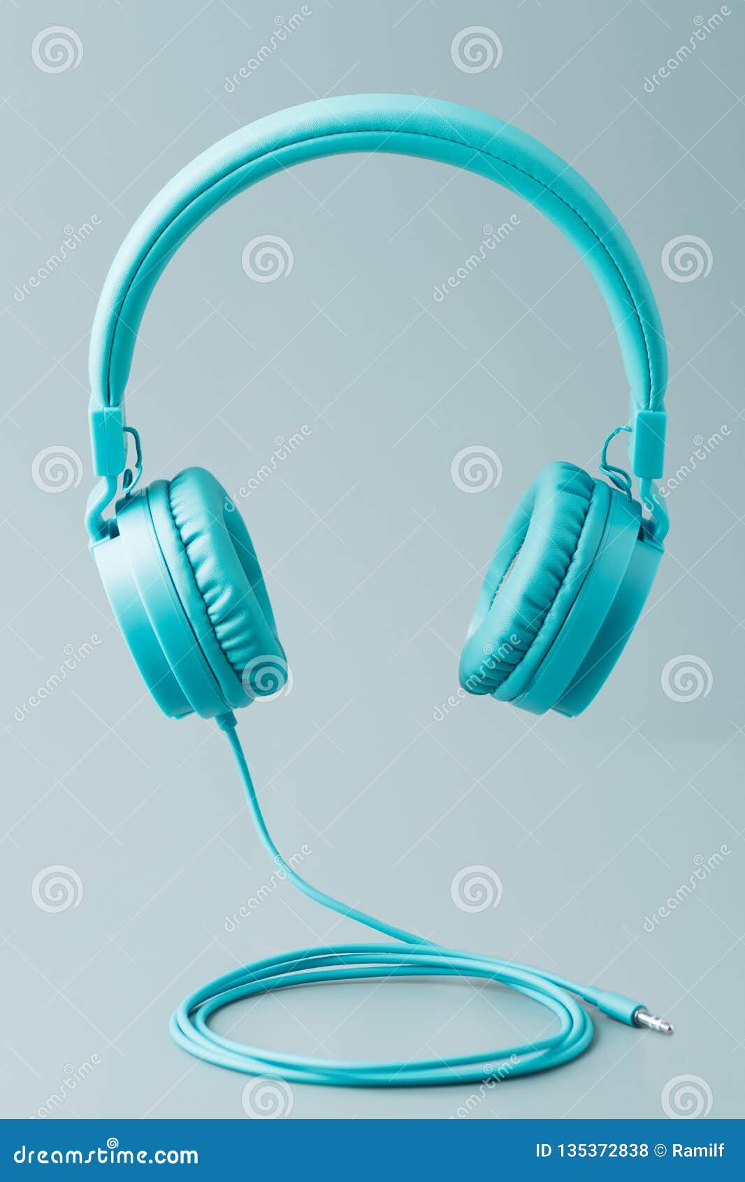 Bright Blue Headphones on Gray Stock Photo - Image of gray, earphone ...