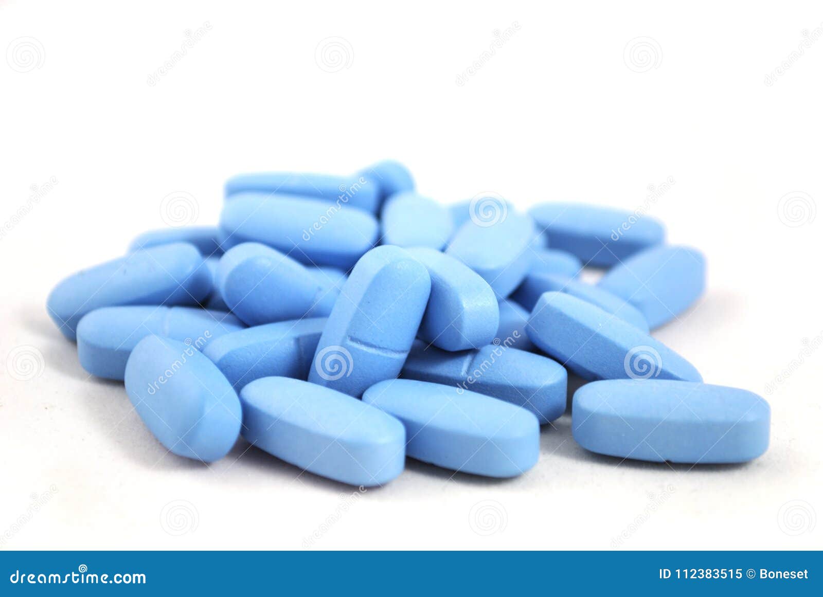 Bright blue oval tablets stock image. Image of antibiotic - 112383515