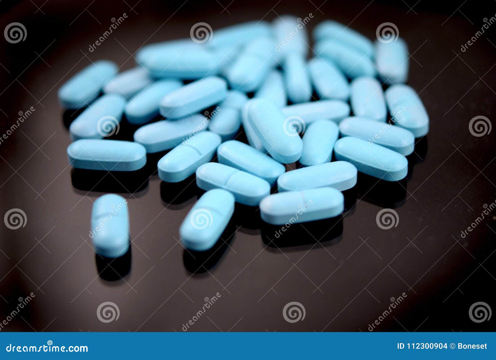 Bright Blue Oval Tablets Isolated Stock Photo - Image of medicament ...