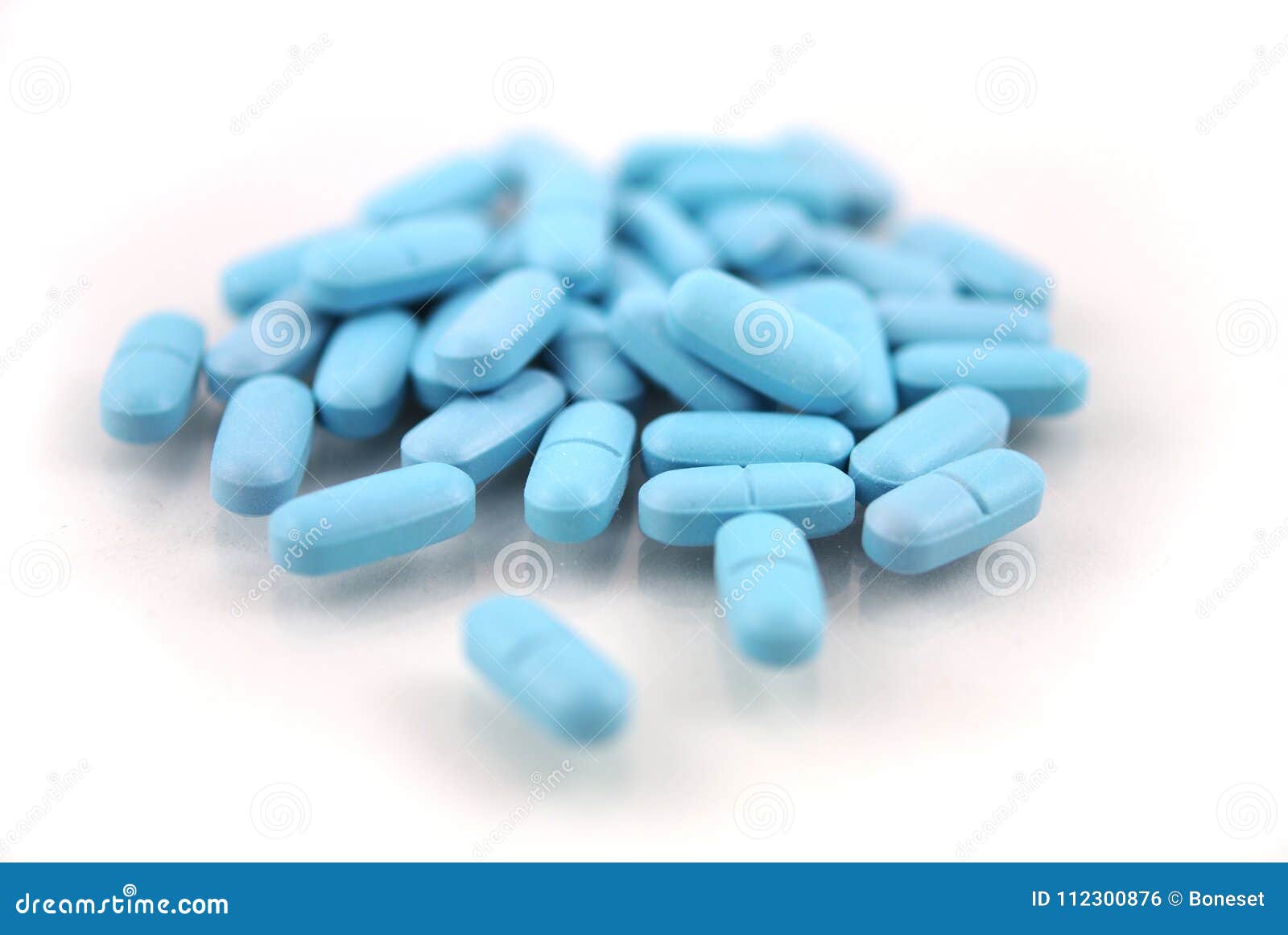 Bright Blue Oval Tablets Isolated Stock Photo - Image of medical, drug ...