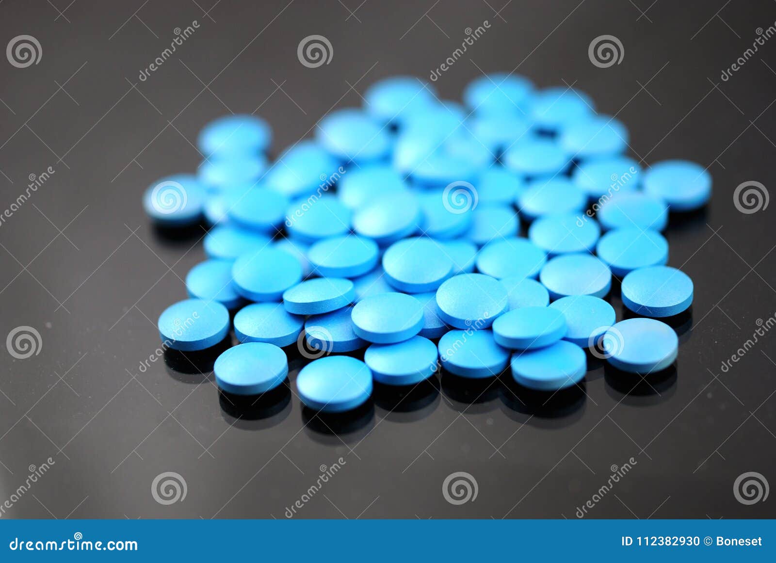 Bright blue round tablets stock photo. Image of headache - 112382930