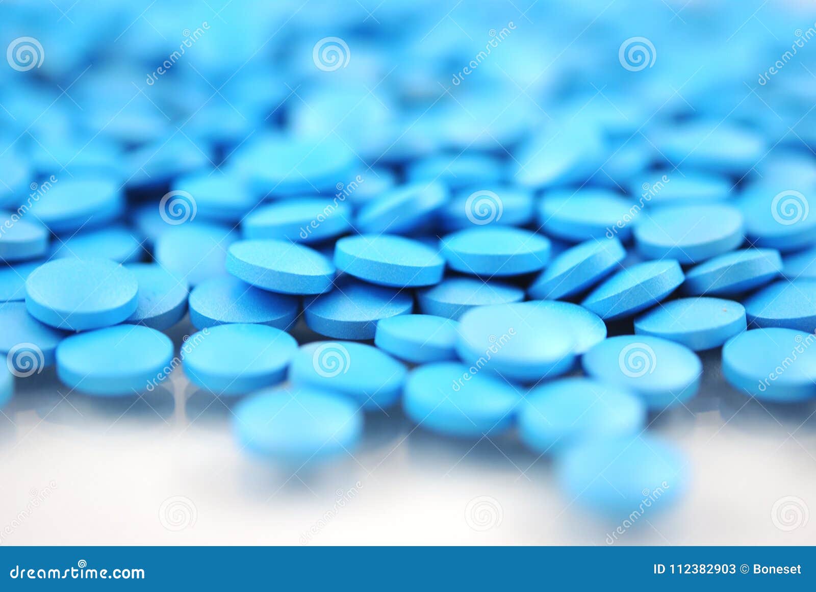 Bright blue round tablets stock image. Image of bright - 112382903