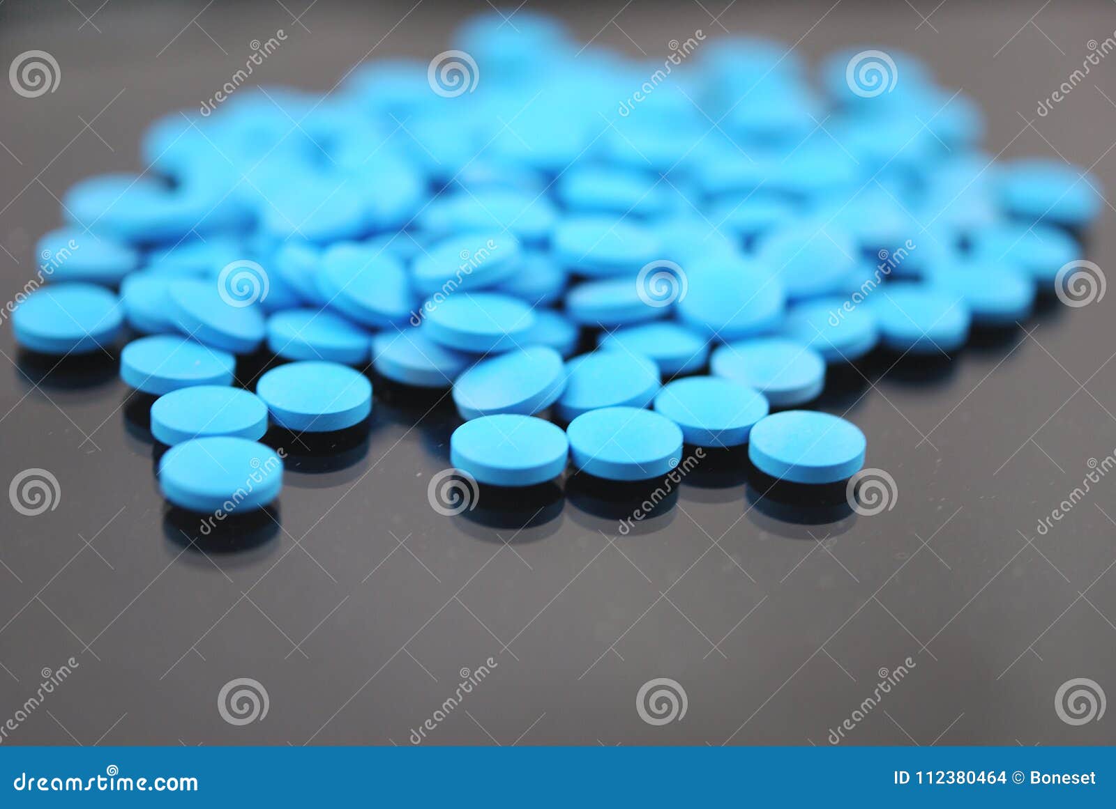 Bright blue round tablets stock photo. Image of hospital - 112380464