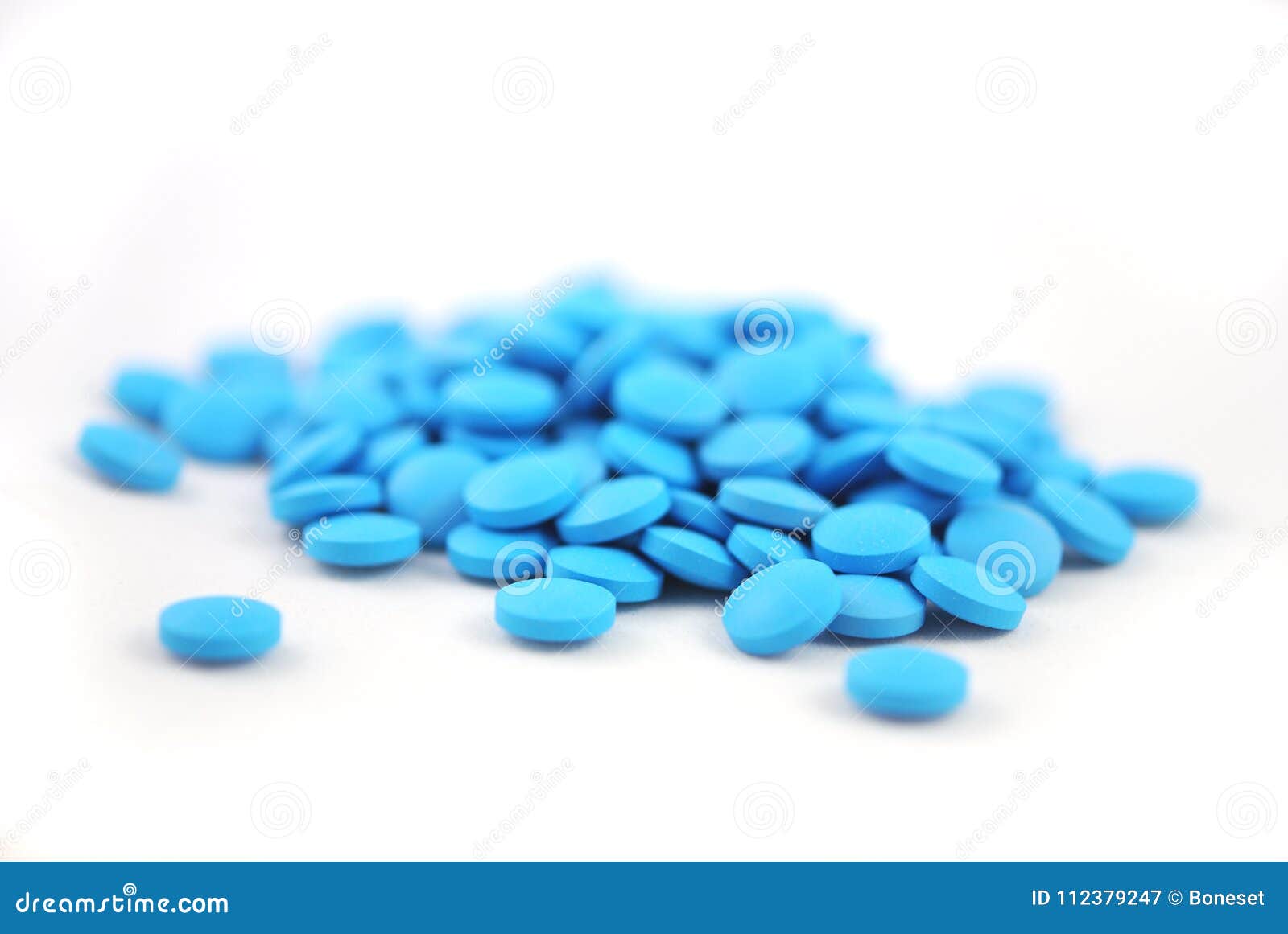 Bright blue round tablets stock image. Image of backgroud - 112379247