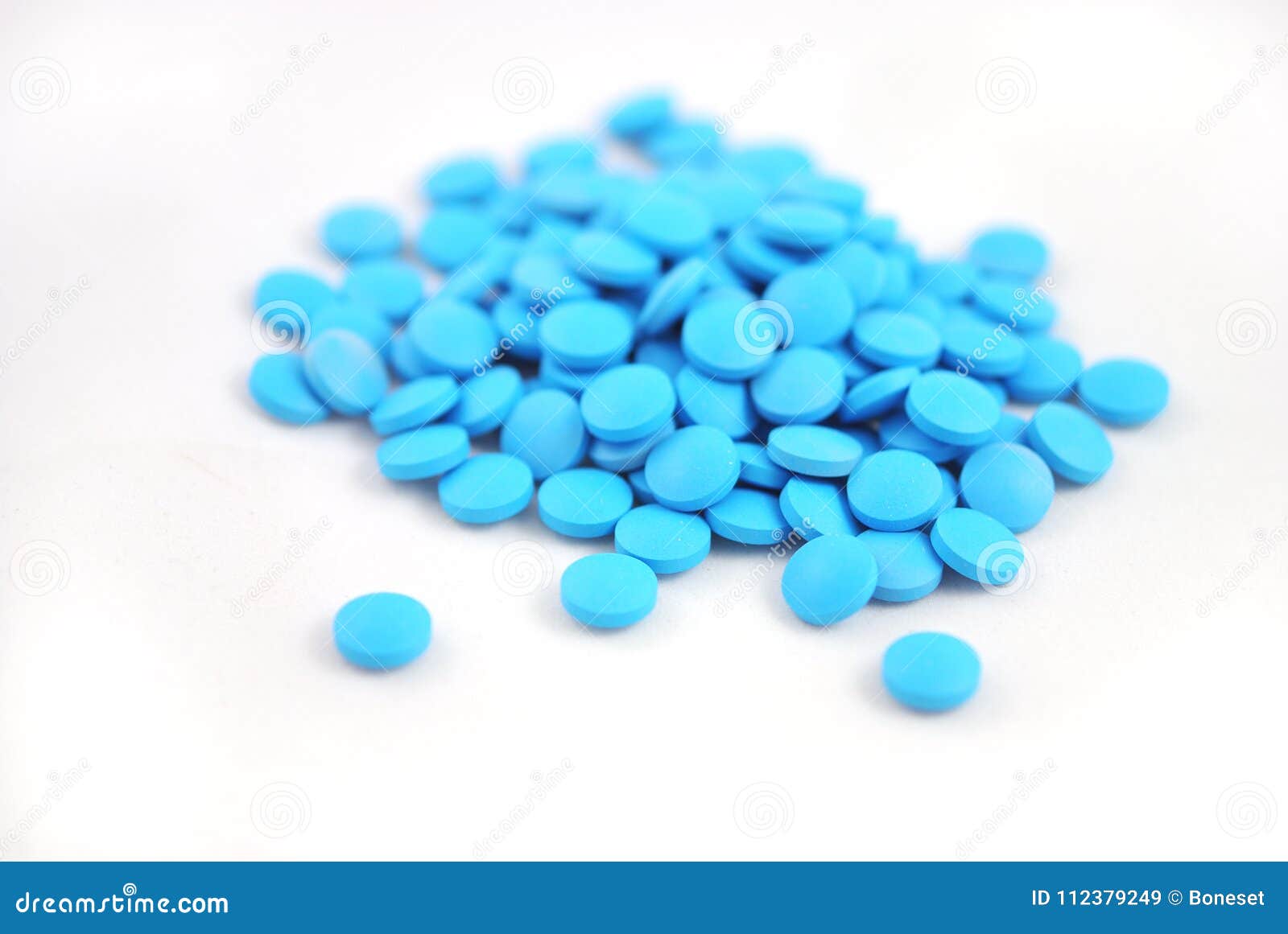 Bright blue round tablets stock image. Image of healthy - 112379249