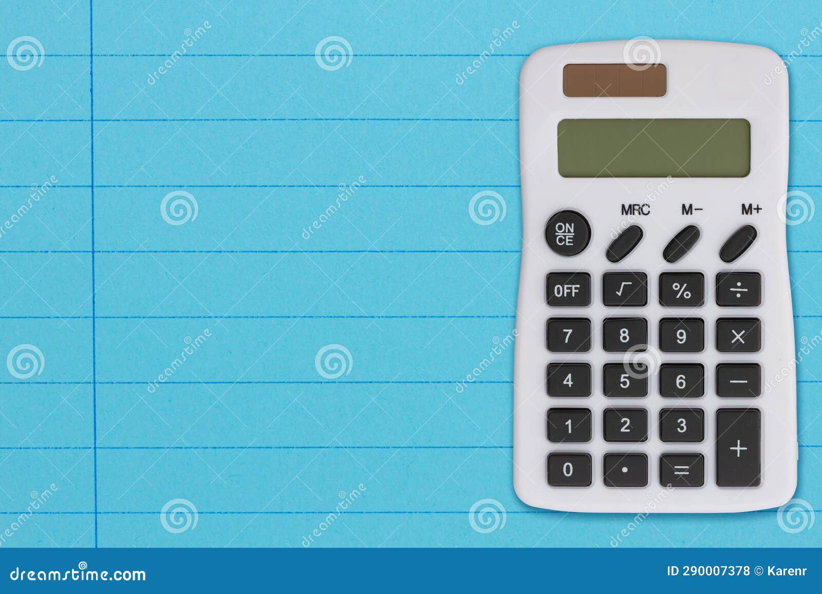 Bright Blue Ruled Line Notebook Paper with a Calculator Stock Photo ...
