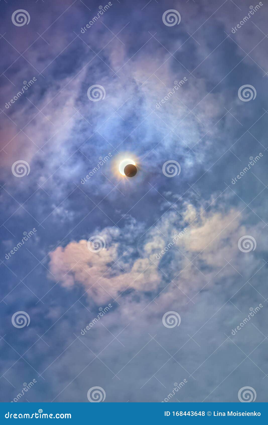 Bright Blue Sky with Clouds and a Solar Eclipse Stock Photo - Image of ...